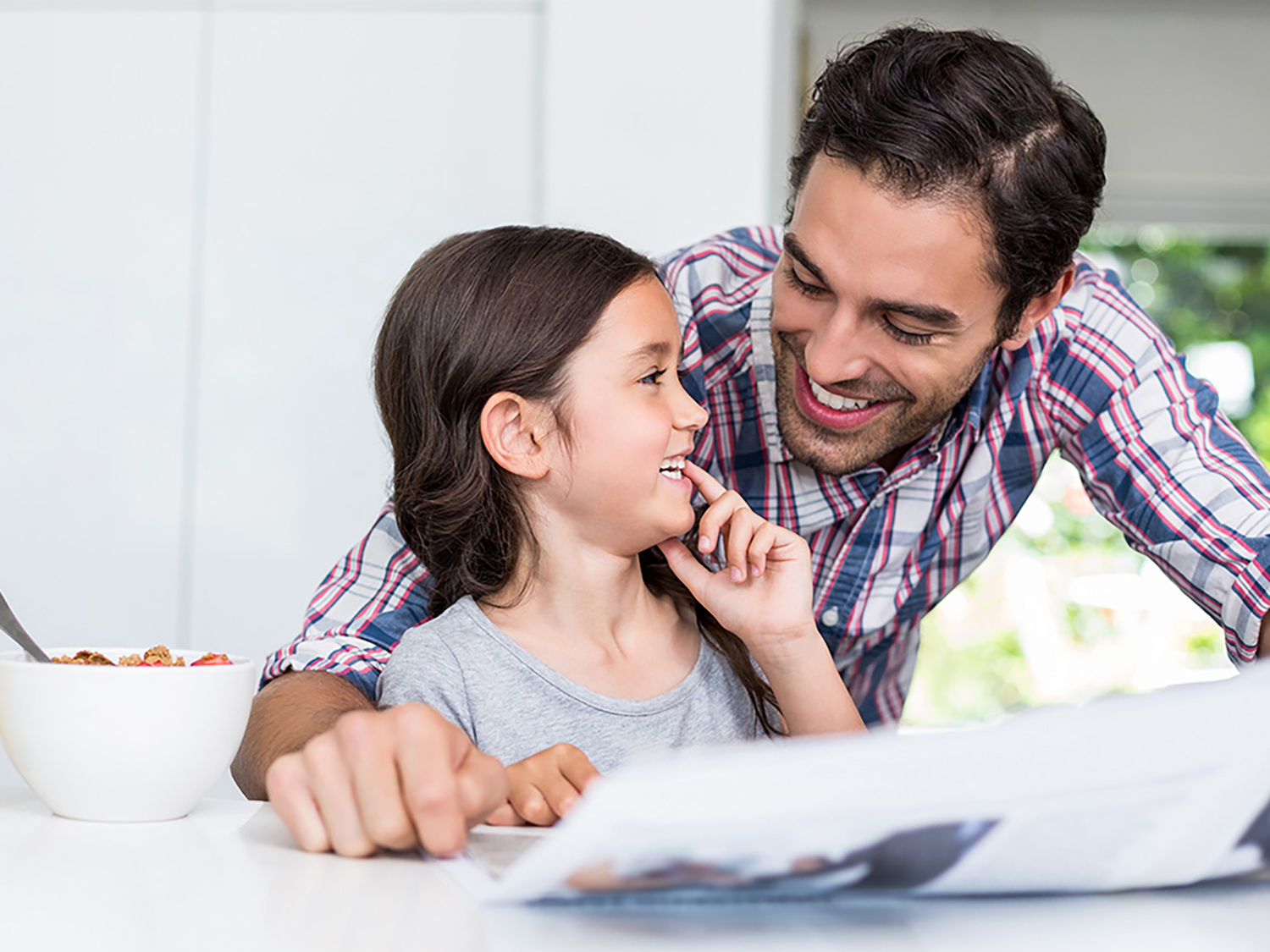 6 Ways to Fit in Read-Aloud Time With Your Child on Busy Days | Scholastic